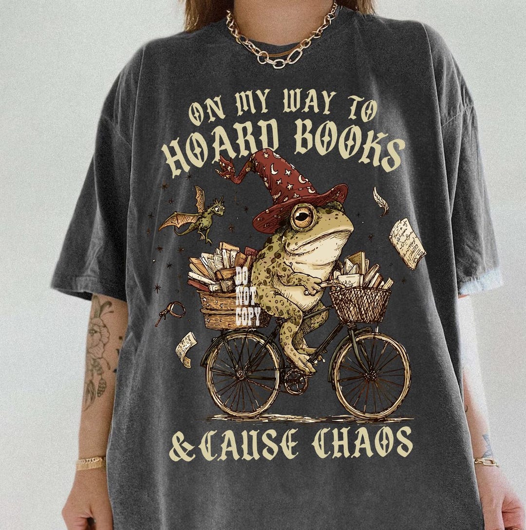 Funny Hoard Books Cause Chaos Png, Frog on Bike Witch Hat Png, Frog ...