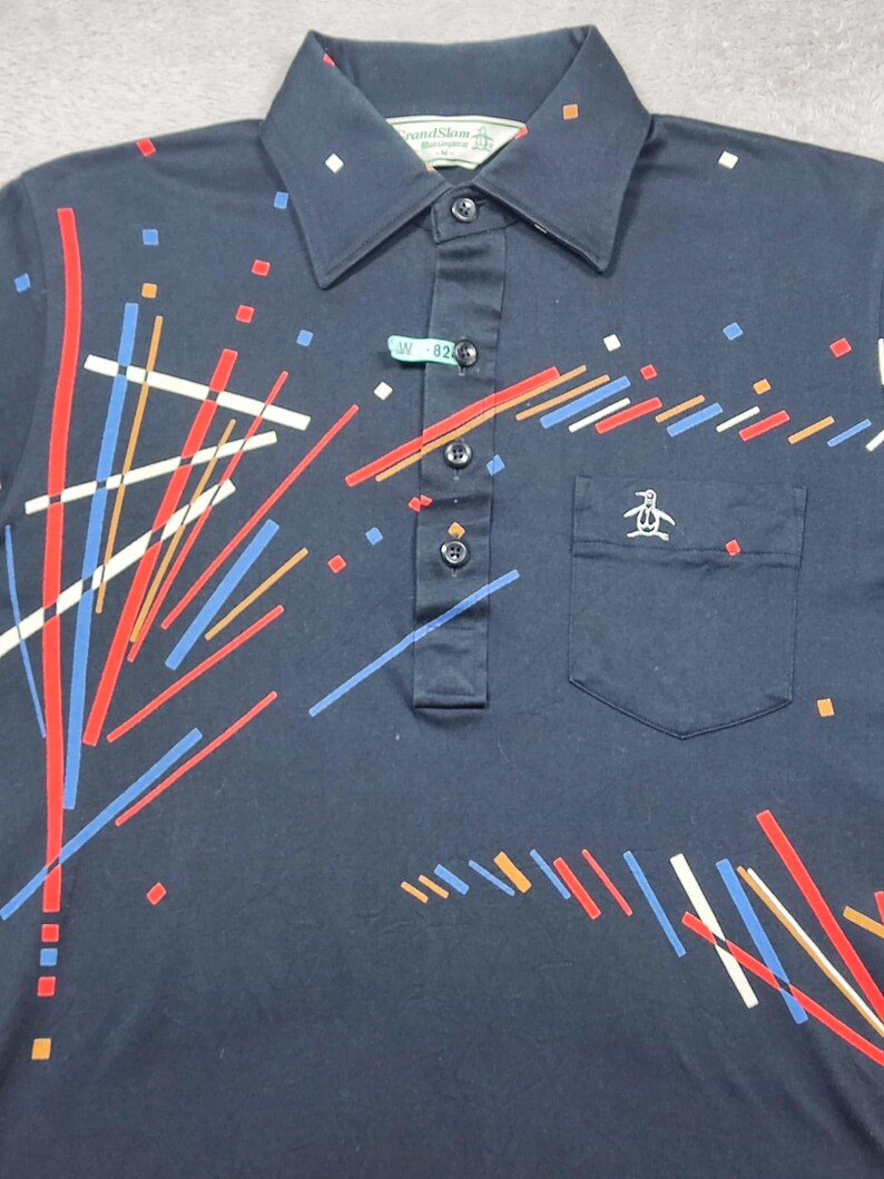 Vintage 1970s-80s Munsingwear Grand Slam Penguin Polo Shirt | Fireworks ...