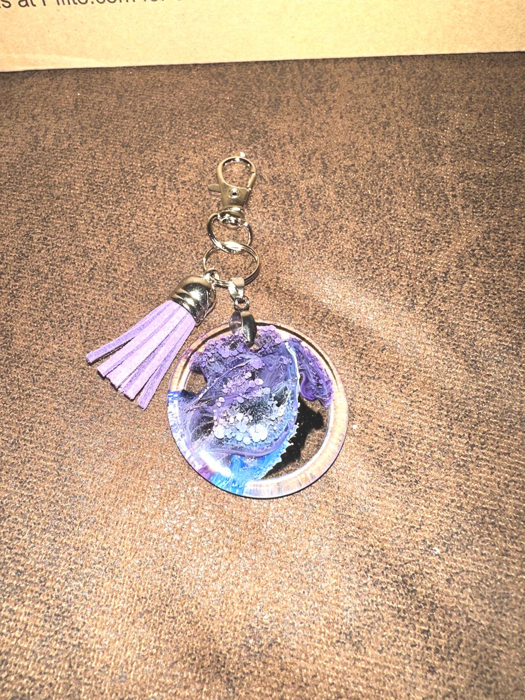 Circle Shaped Key Chain Made From Resin. Blues, Purples and Black in ...