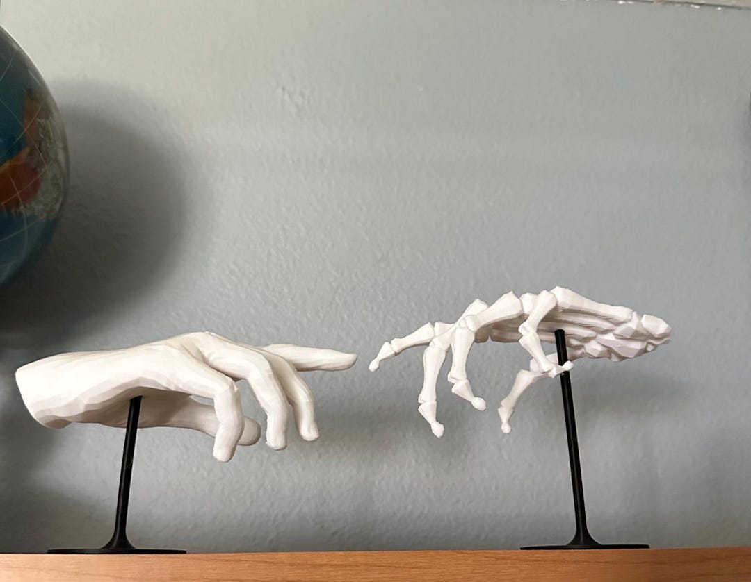 Creation Reimagined – Human & Skeletal Hand Sculpture - Etsy
