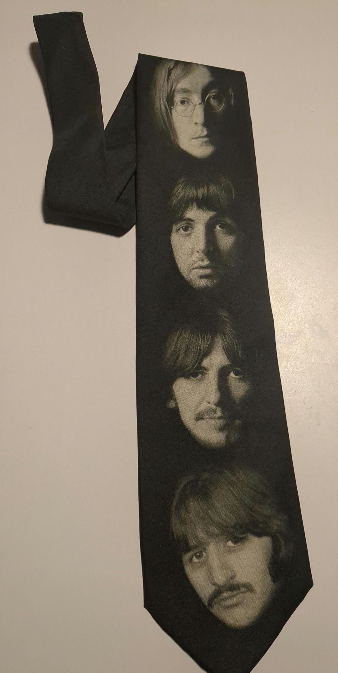 The Beatles Novelty Necktie Black Silhouettes of the Beatles Faces ...