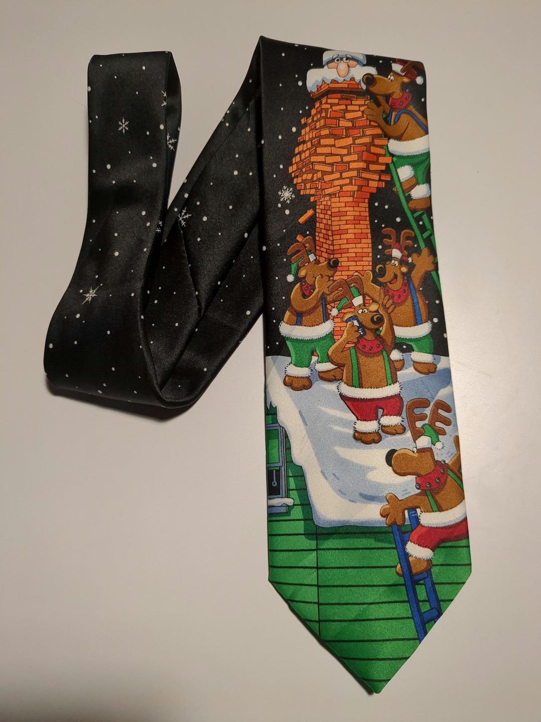 Santa Stuck in Too Small of a Chimney Reindeer Trying to Help Tie ...