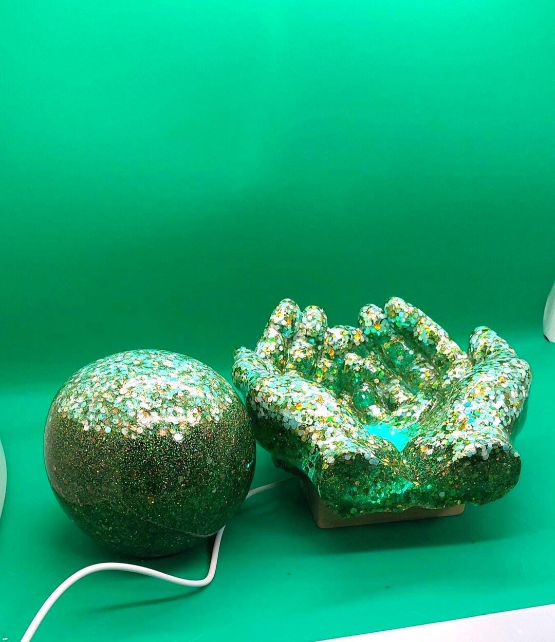Green Lighted Ball in Cupped Hands - Etsy