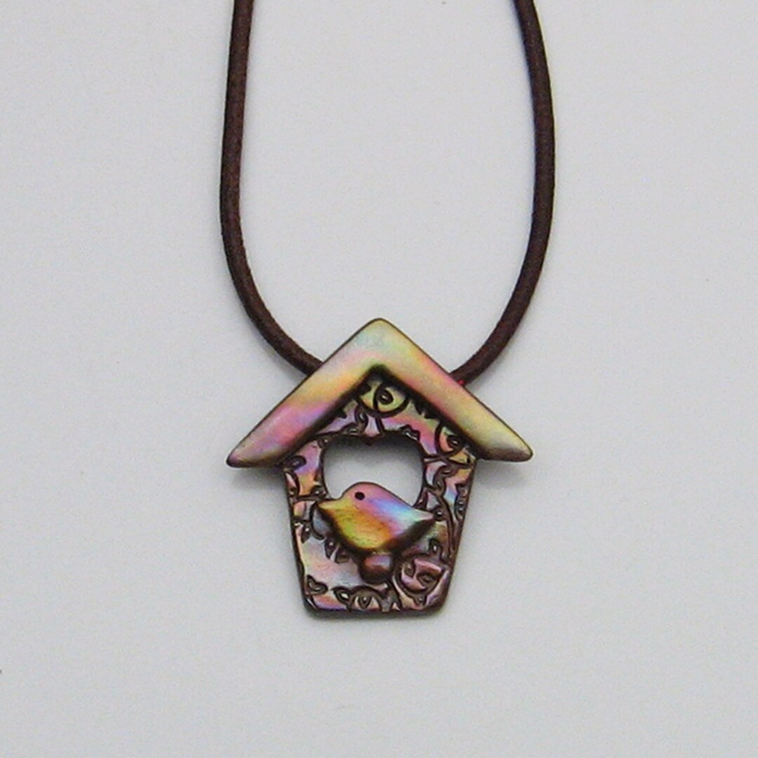 Handmade Copper Bird House With Colorful Heat Patina on Brown Leather ...