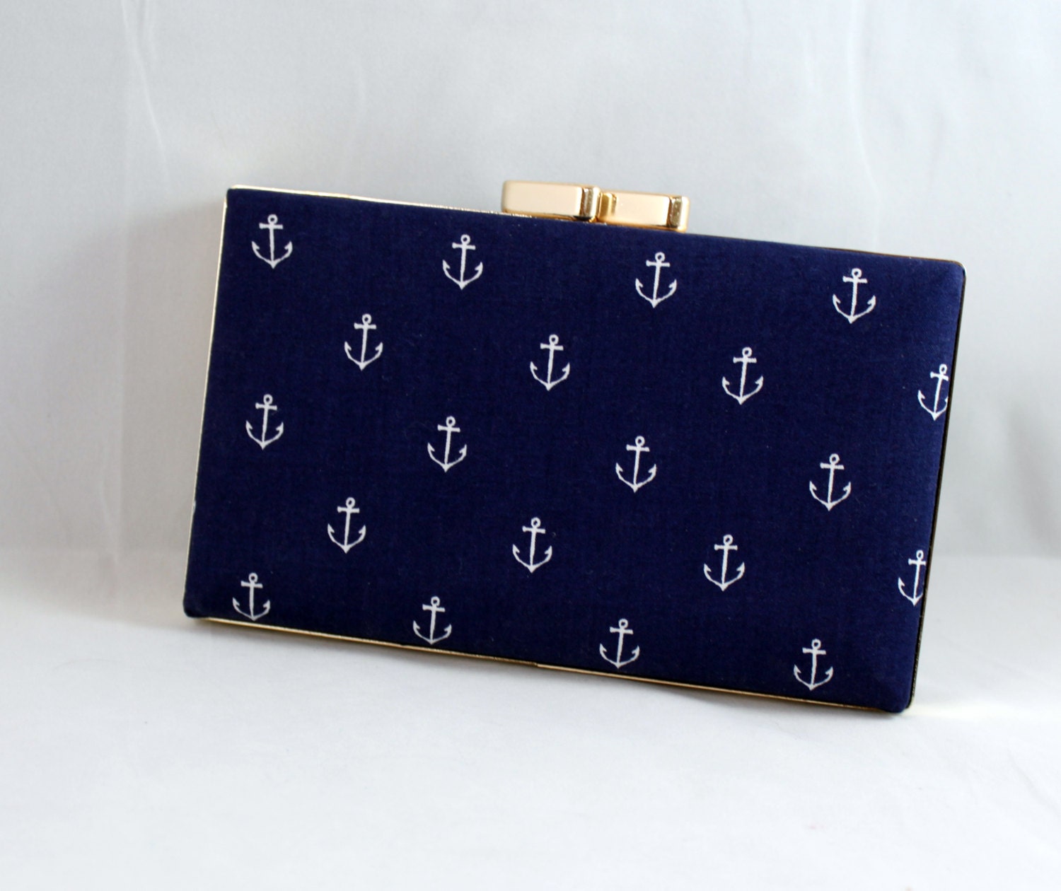 Navy blue box clutch with white anchors