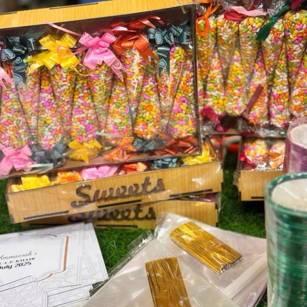 Filled Sweet Cones Cute and Nice Sweets Box With Colorful Ties and ...