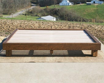 NbRsN02a Solid Hardwood Platform Bed with large block feet with platform extensions on top of sides and ends natural color
