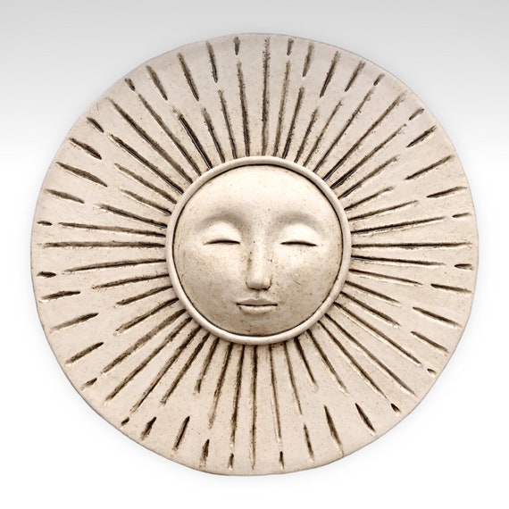 Clay Sun Faces