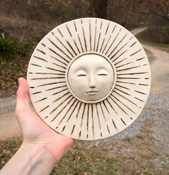 Clay Sun Faces