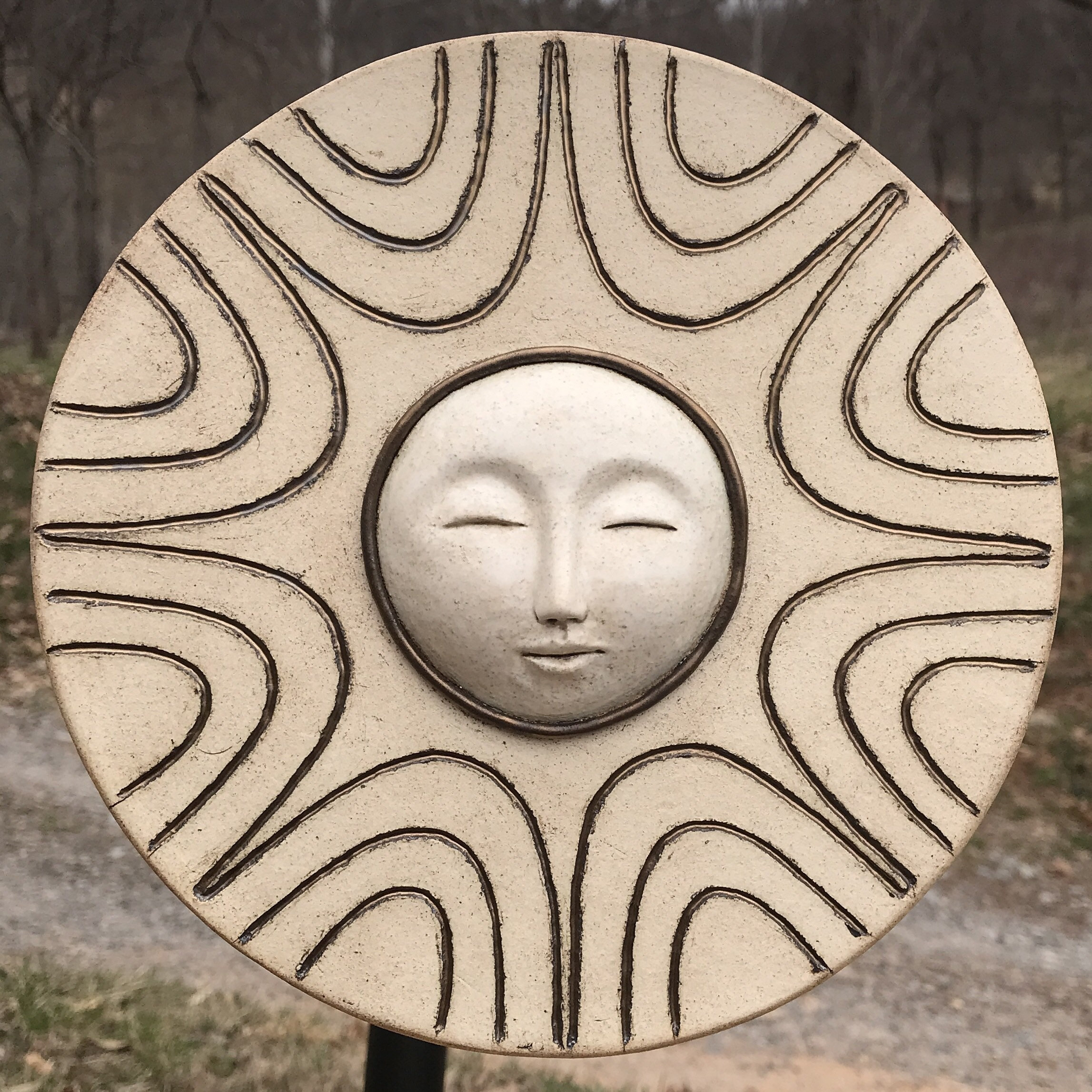 Clay Sun Faces