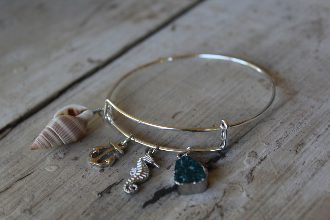 Seashell, Anchor, Seahorse and a Sea Blue Gemstone on a Bangle Bracelet ...