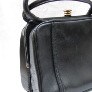 Black Leather Top Handle Handbag With Unique Knob Closure, Tailored and ...