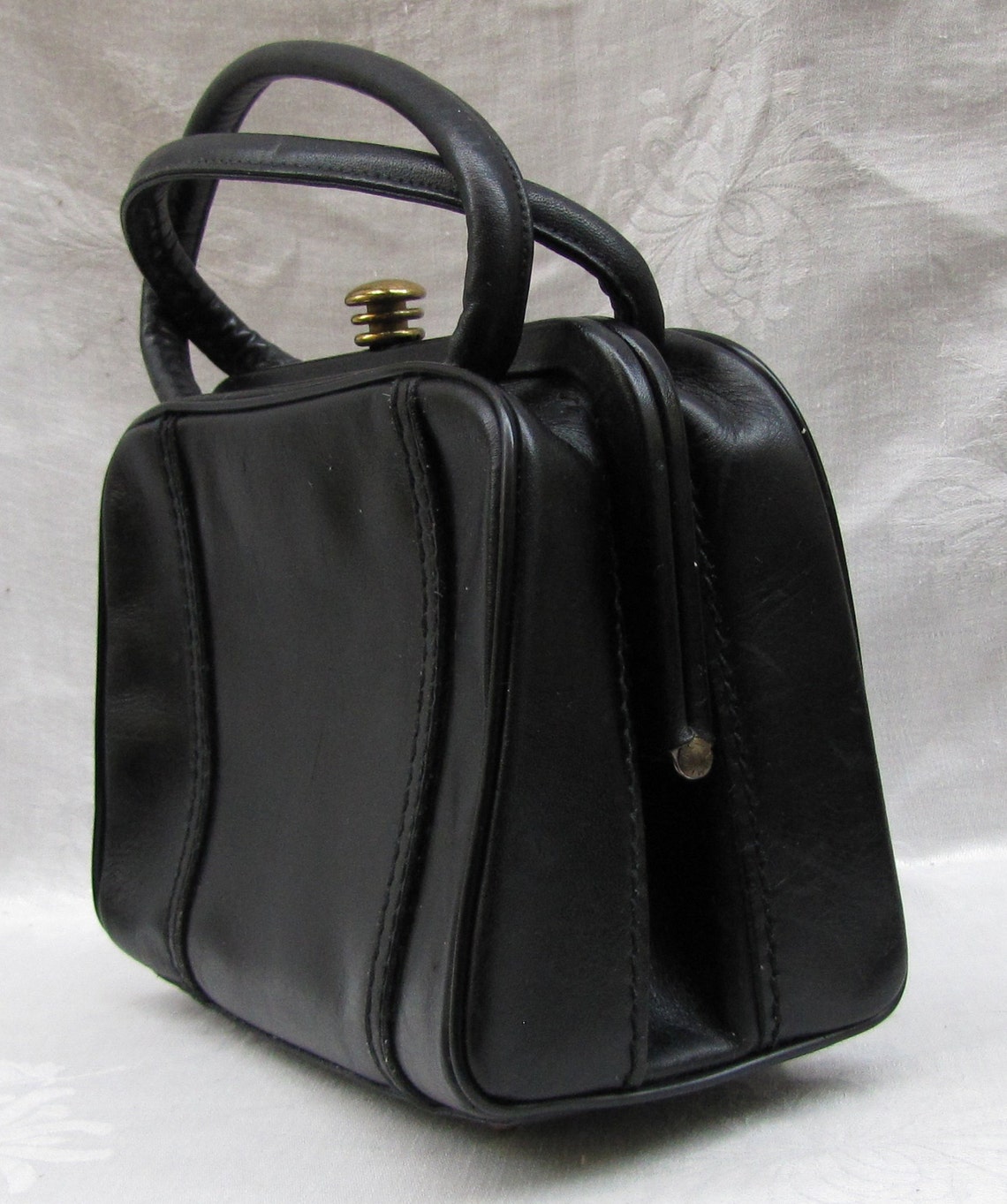 Black Leather Top Handle Handbag With Unique Knob Closure, Tailored and ...