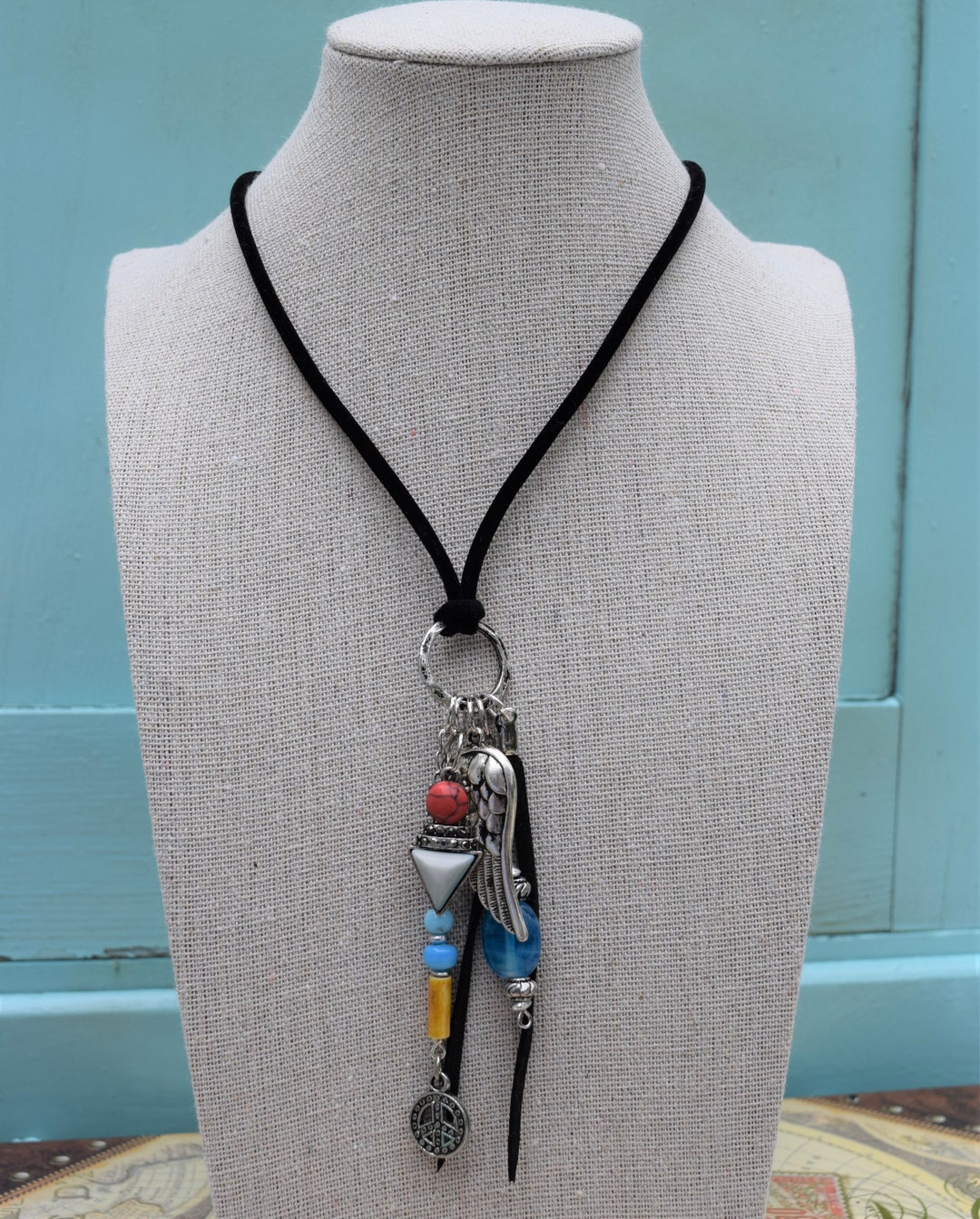 Freedom Necklace With Peace Symbol, Angel Wing, and Charms on Black ...