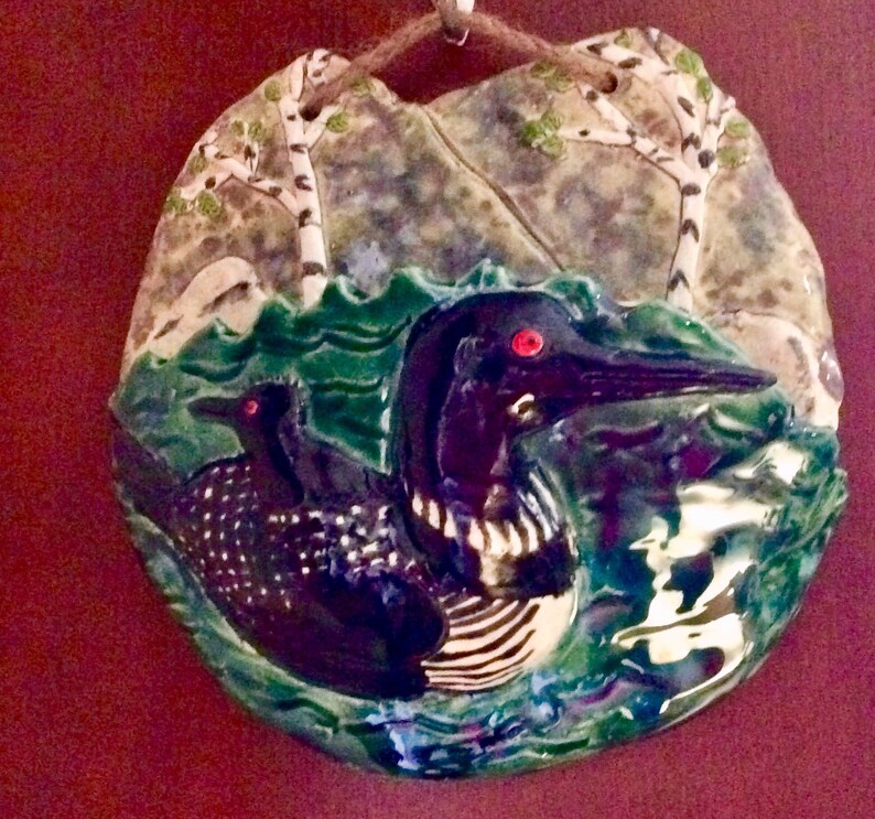 Loon Wall Pocket handmade from a lump of clay | Etsy