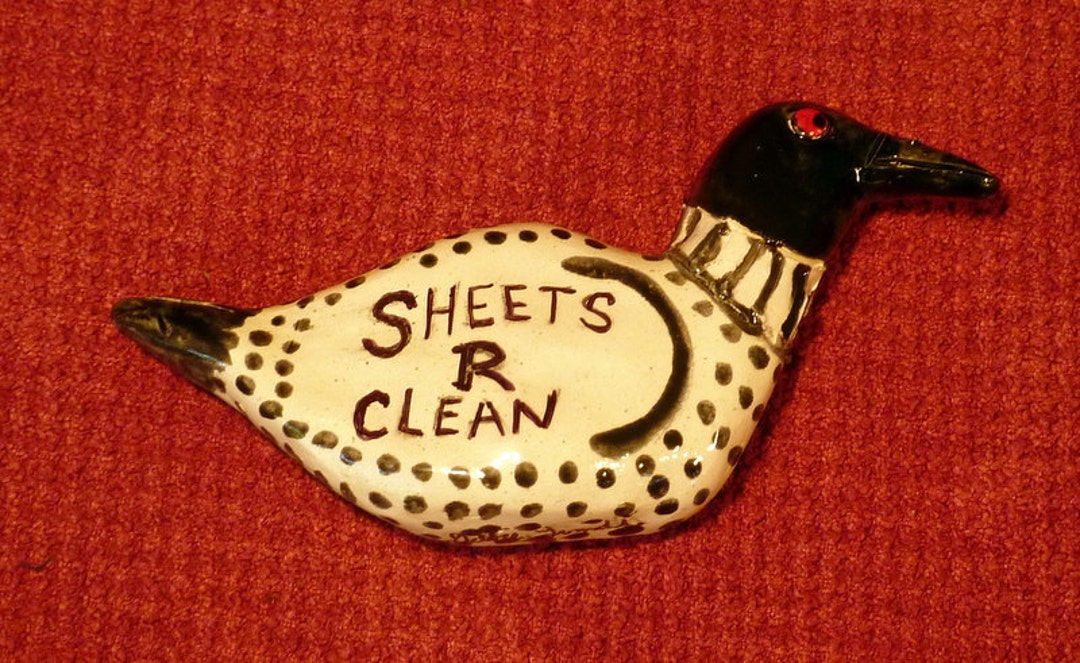 SHEETS R CLEAN Loon Sits on Your Guest Bedroom Bed to Remind You That ...
