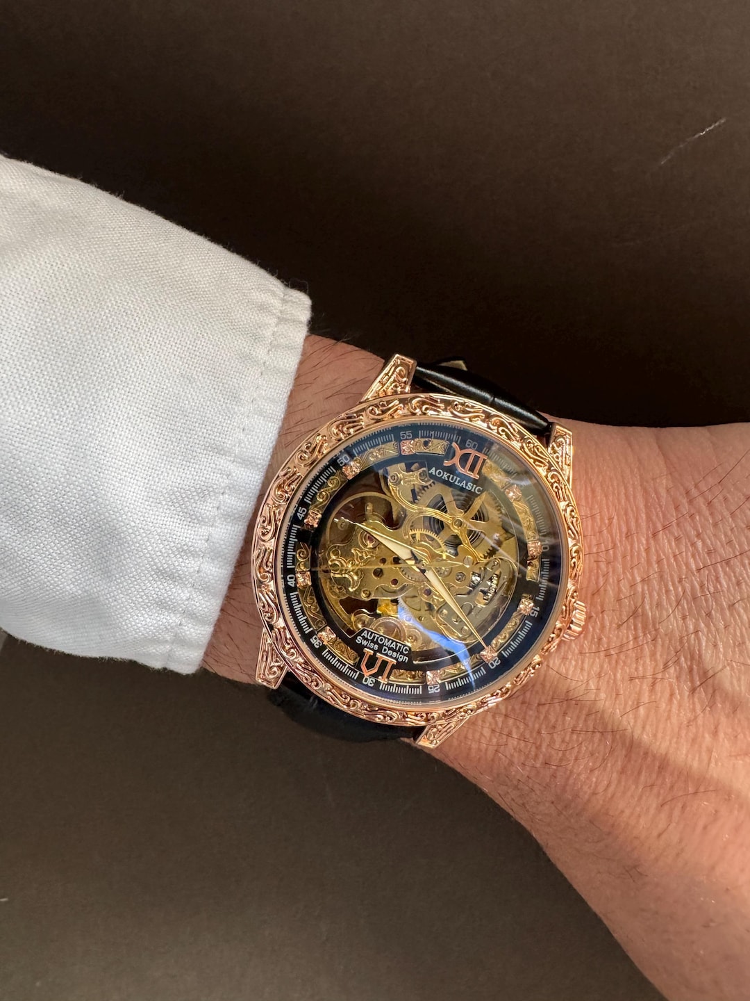 Luxury Gold Skeleton Mechanical Watch: Engraved Case, Black Leather ...
