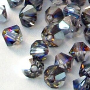 24pc - 4mm Rare Swarovski Crystal Meridian Blue Bicone Spacer Beads ...