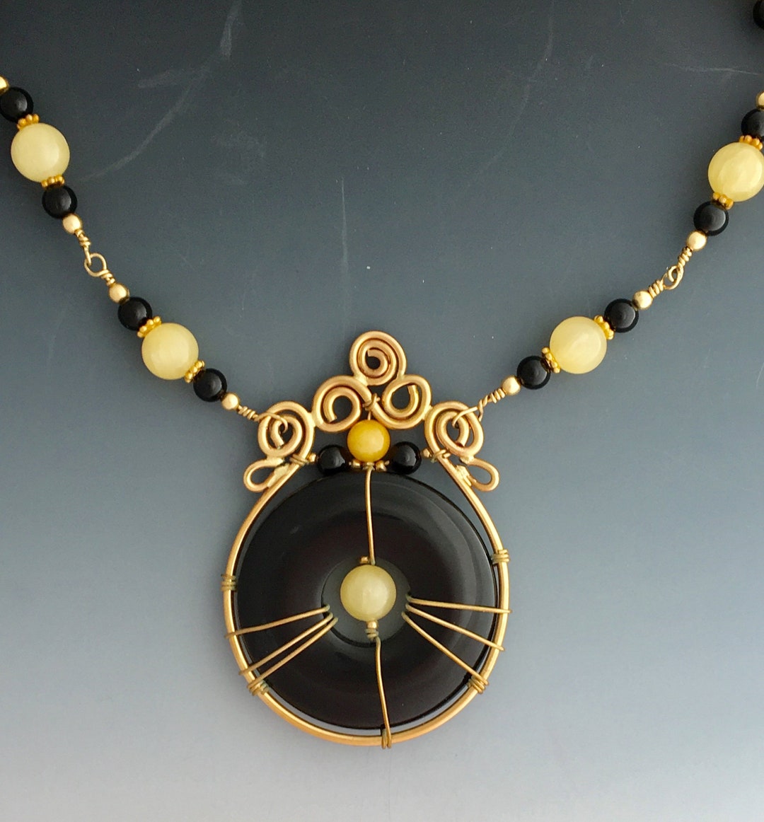 Black Onyx Donut Wire Wrapped With Yellow Gold Filled Wire With Black ...