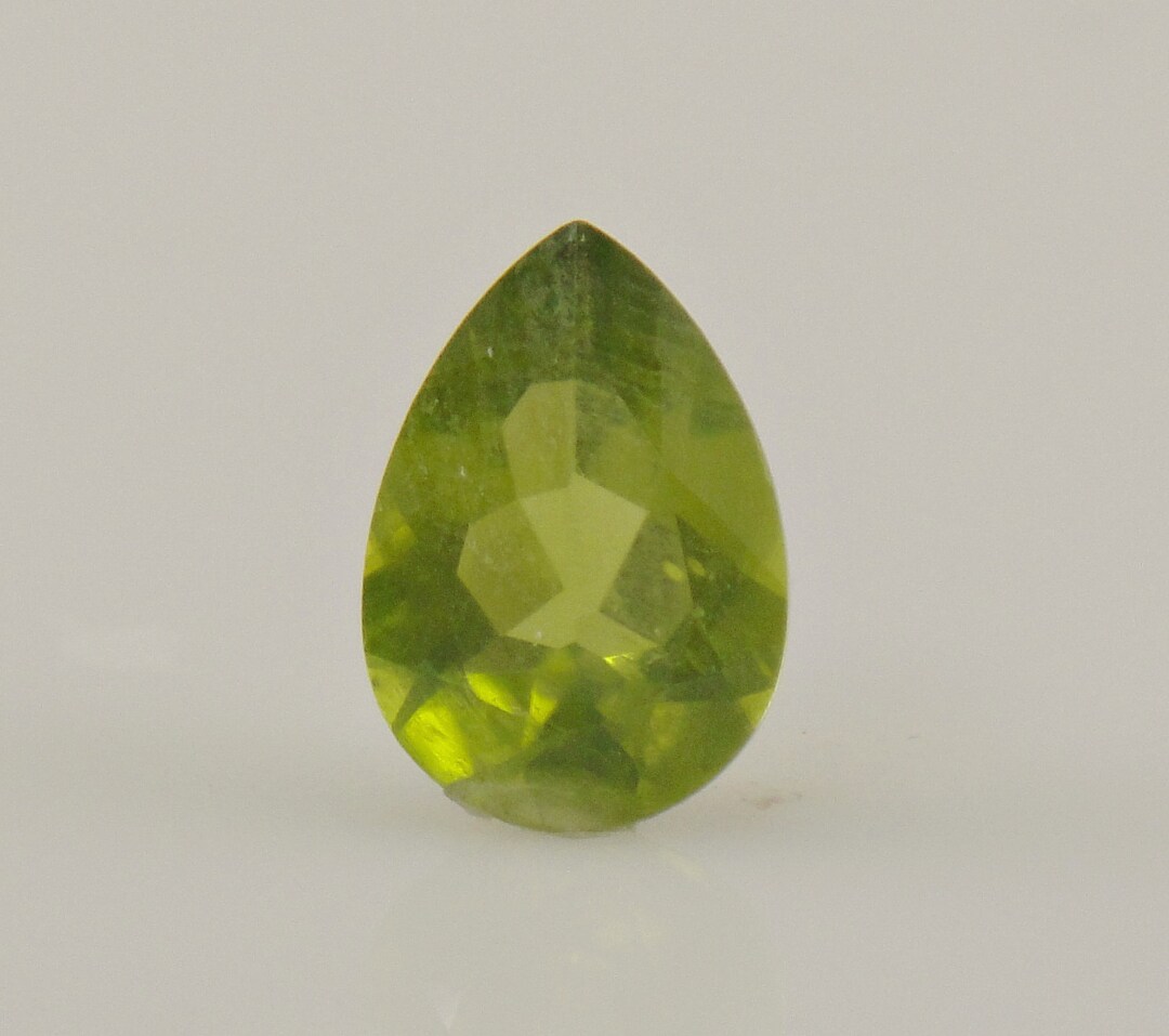 Faceted Peridot Pear Shape Loose Gemstone Measuring 11 X 7.5 X 4 Mm and ...