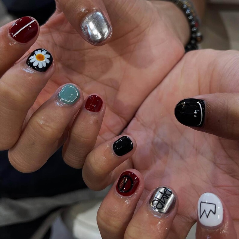 Abstract Graphic Nail Art With Bold Colors | Black, Red, Silver ...
