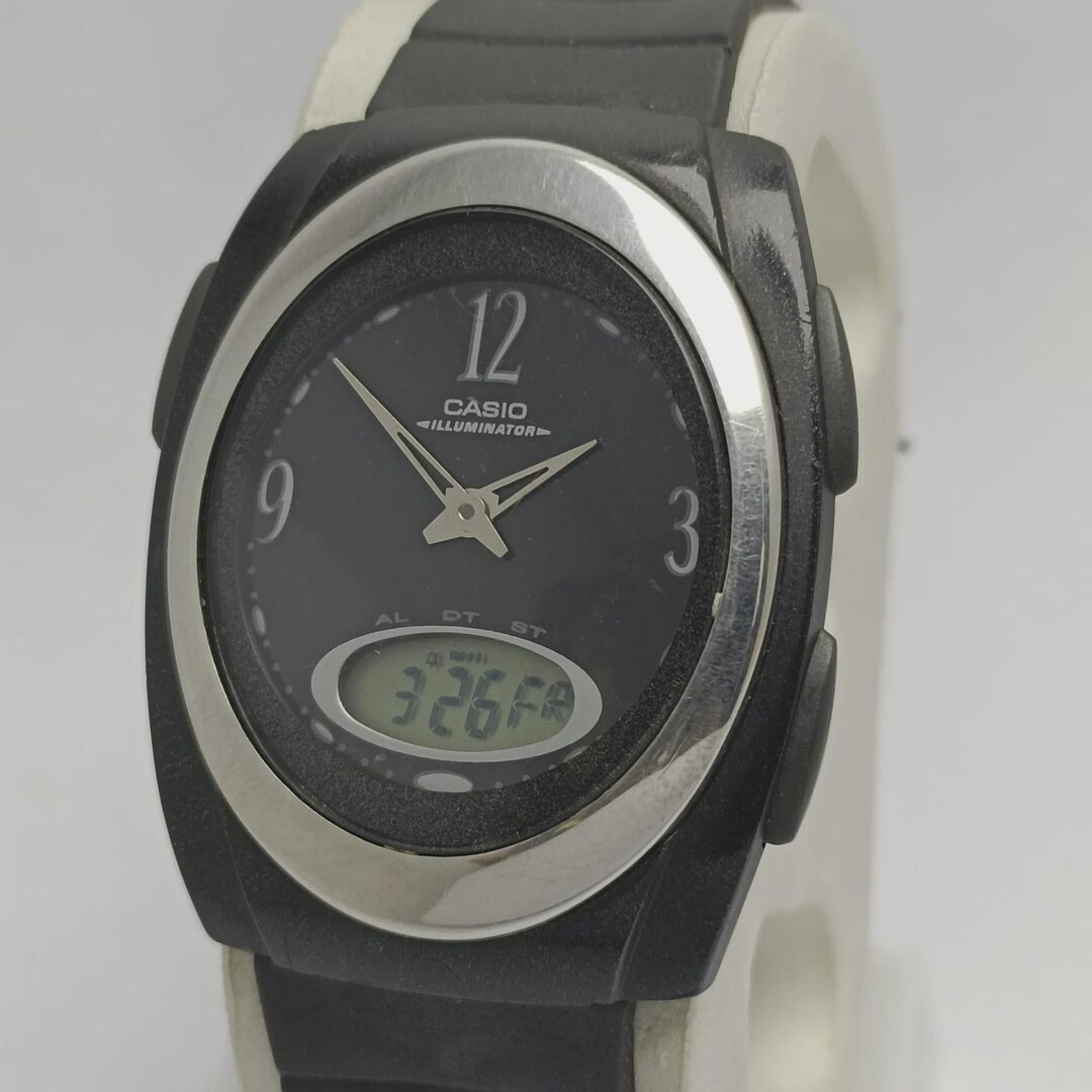 Casio Illuminator AQ-E10 Ana-digi 2384 Vintage Watch - Etsy