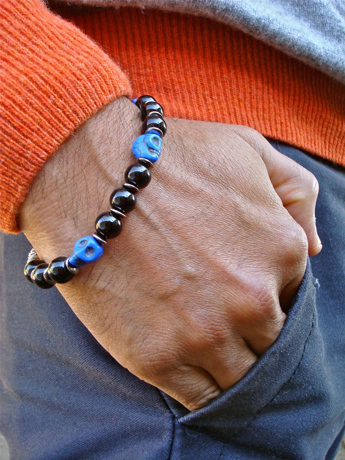 Men's Rocker Bracelet With Cobalt Howlite Carved Skulls, Black Agate ...