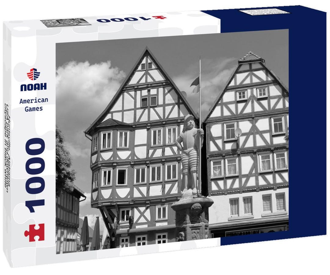 Half-timbered Houses Surround Fountains in Treysa Schwalmstadt, Germany ...