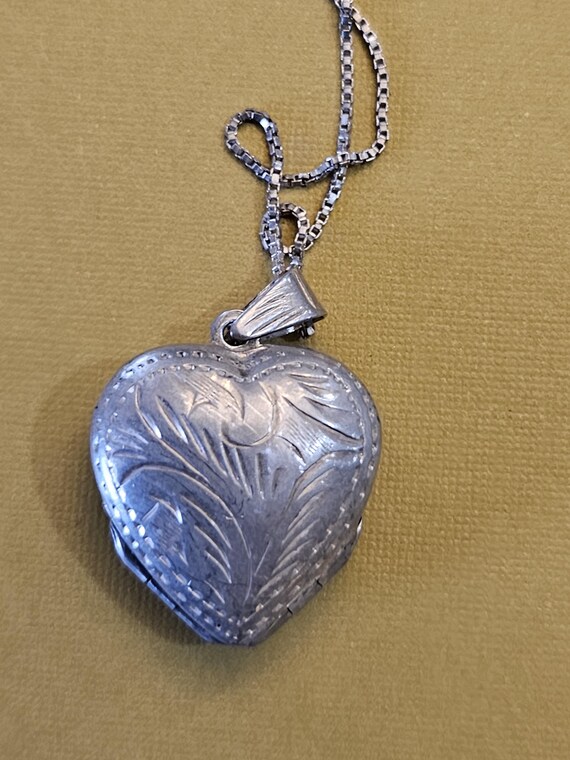 Unusual heart locket that turns into a four leaf clov… - Gem