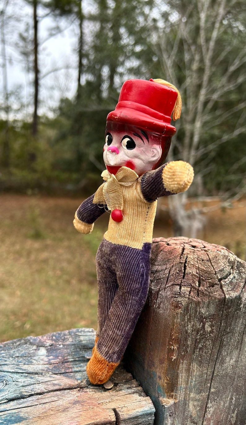 Monkey Doing Monkey Business Things This Monkey Doll Has a Thin Plastic ...