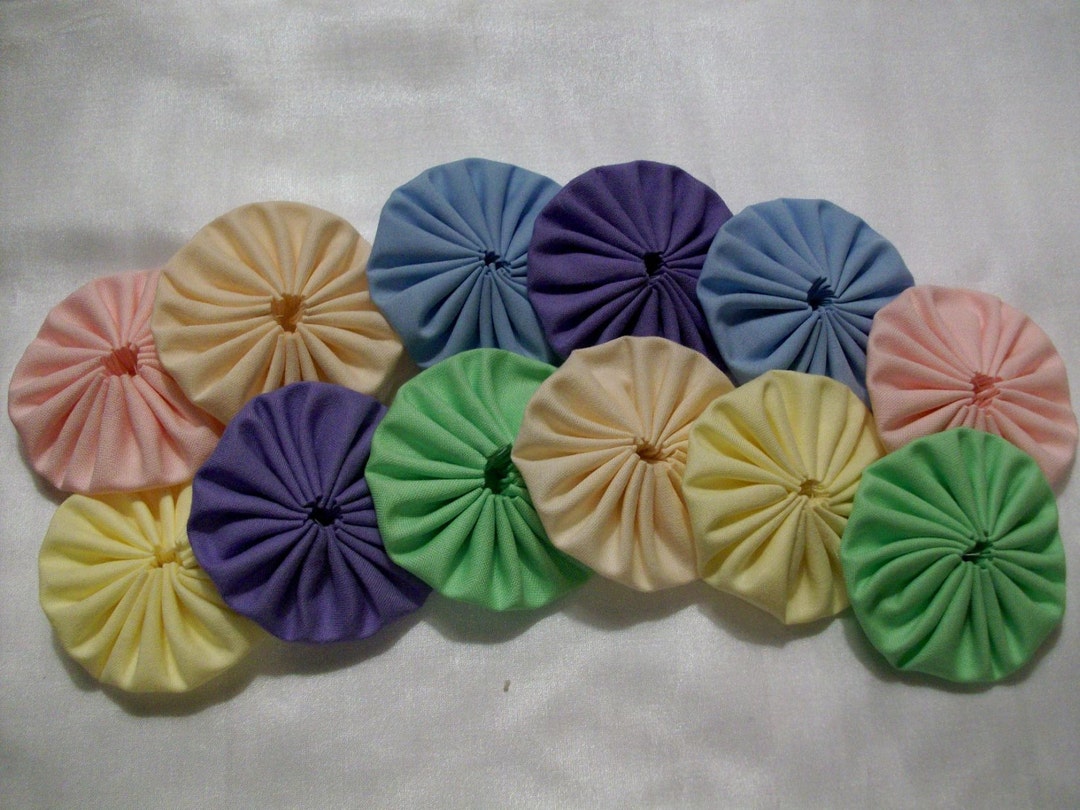 12 Pc. Yo Yo Pastel Colors Pink Light Blue Light Green Peach Lavender ...