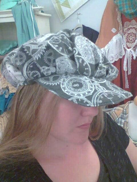 Slouchy flannel clock and gear hat with brim