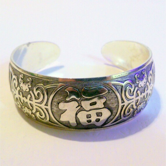 Silver Tone Asian Character Themed Embossed Statement… - Gem