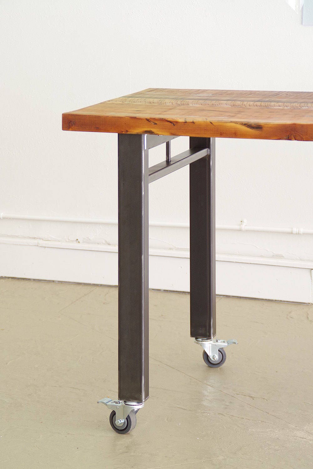 Reclaimed wood and steel table with casters modern | Etsy
