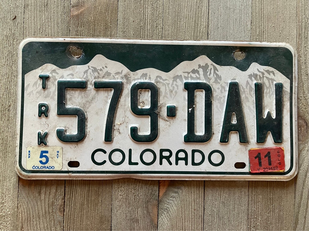 2000s Colorado Truck License Plate 579-DAW Mountains White on Green ...