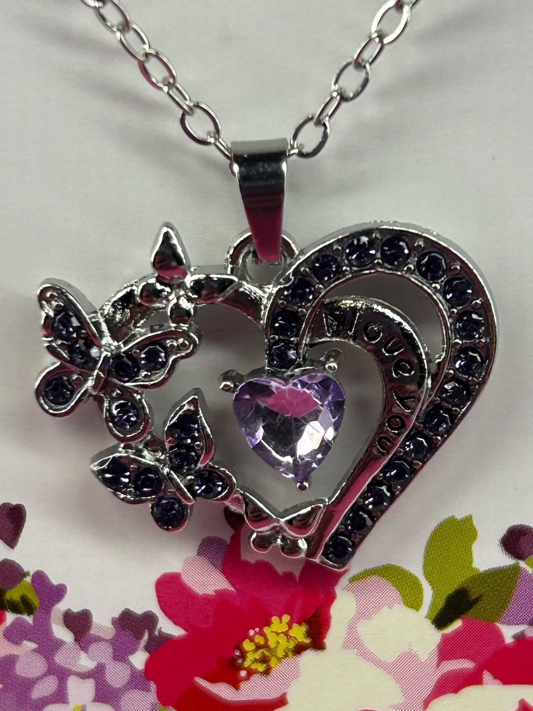 Silver Butterfly Heart Necklace With a Purple Heart Stone in the Center ...