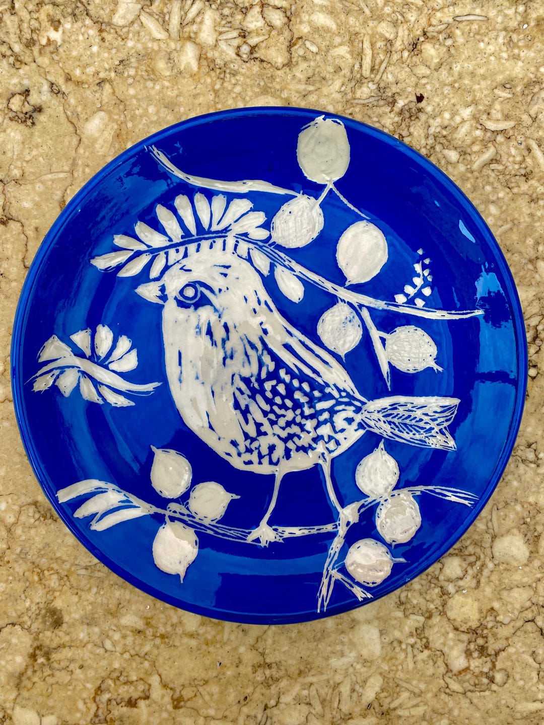 Glazed Ceramic Dinner Plate With Bird Motif on a Blue Background With ...