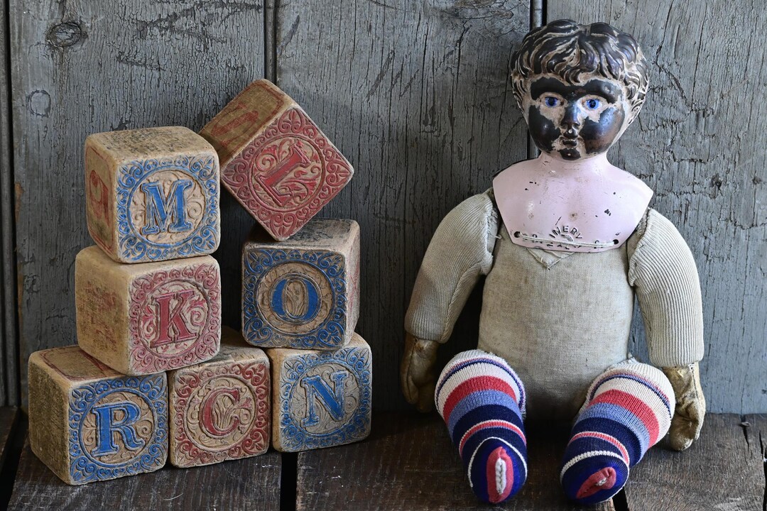 Primitive Antique Tin Minerva Doll With Cloth Body and Colorful Striped ...