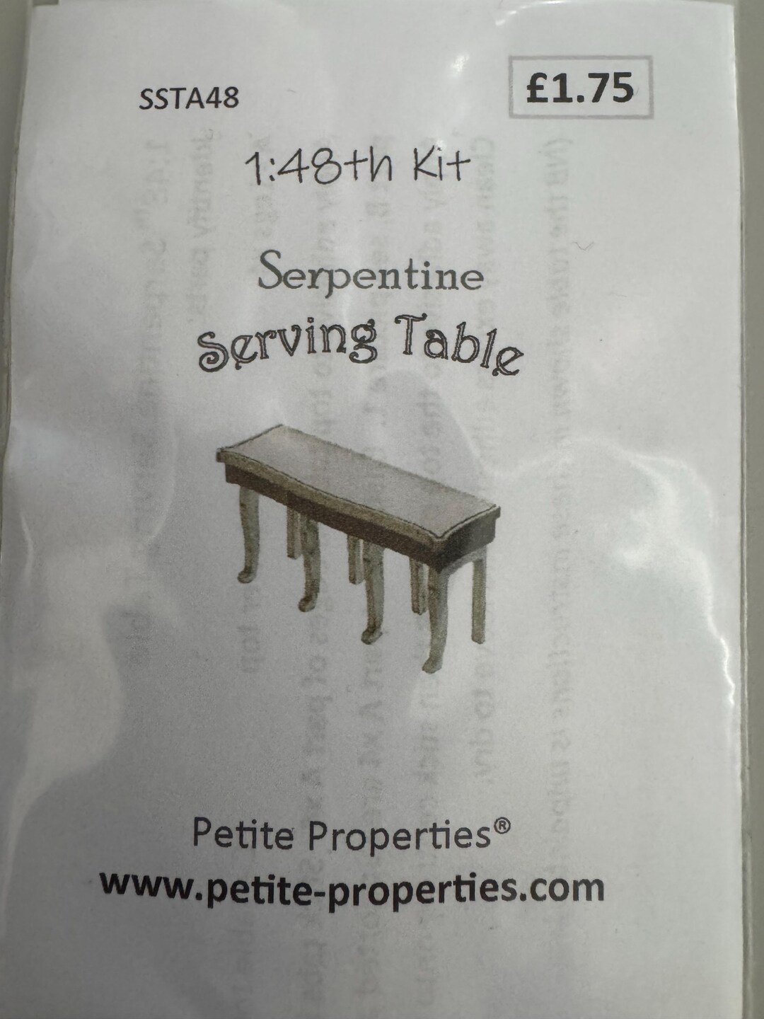 Petite Properties Serpentine Serving Table - Etsy