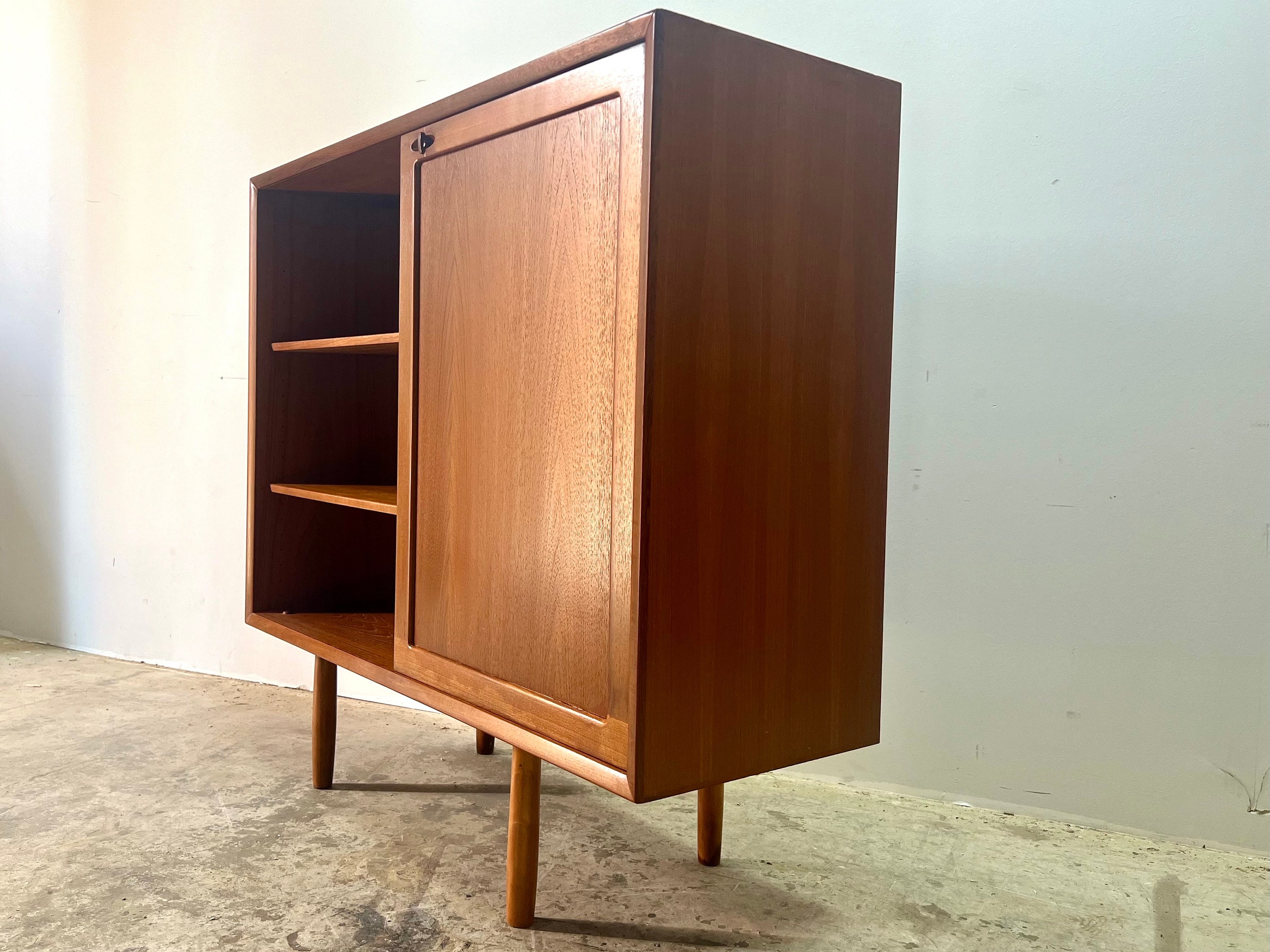 Small teak cupboard store
