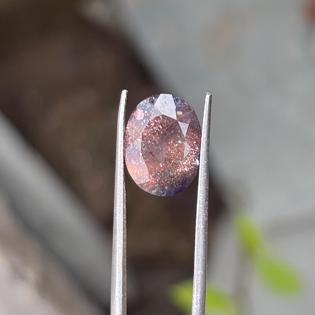 Natural Bloodshot Iolite Gemstone | 4.20 Ct Oval, 12.5 Mm Wine-brown ...