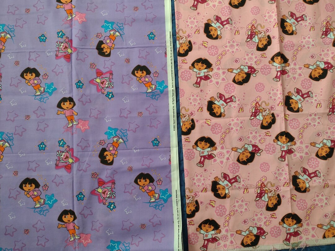 Two Dora the Explorer and Boots Fabrics Both 2005 Purple is 2.5 Yds. Pink is 2 Yds. 44" Wide ...