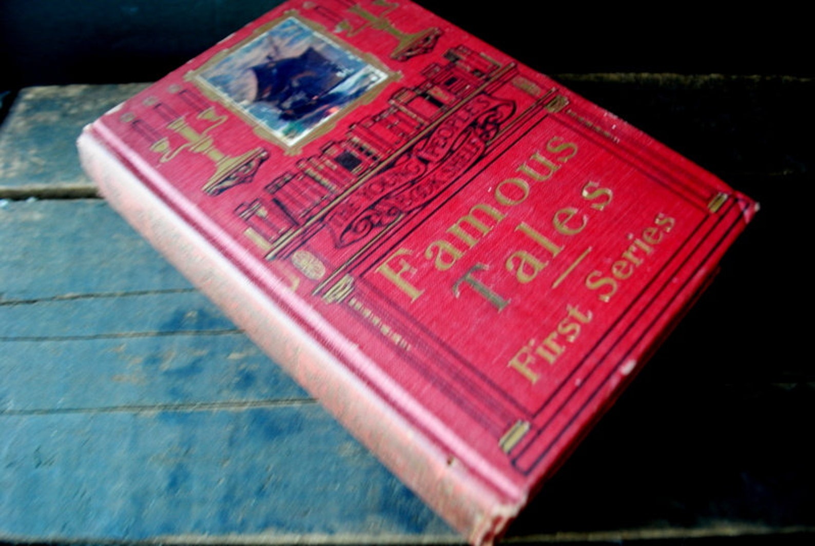 Collectible vintage 20s red hardcover book Famous | Etsy