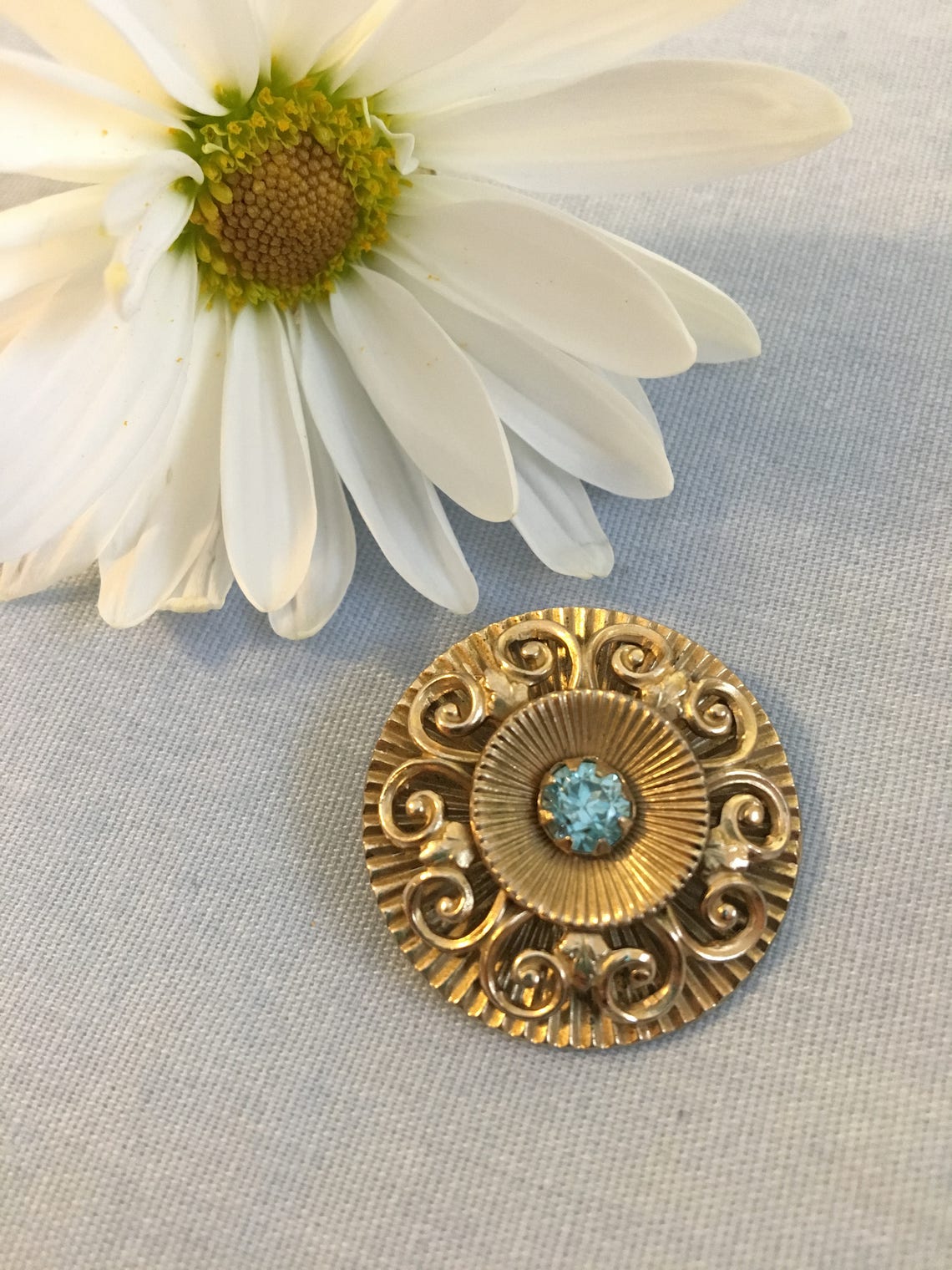 Gold and Blue Rhinestone Brooch Coro Signed Scrolled Pin With Light ...