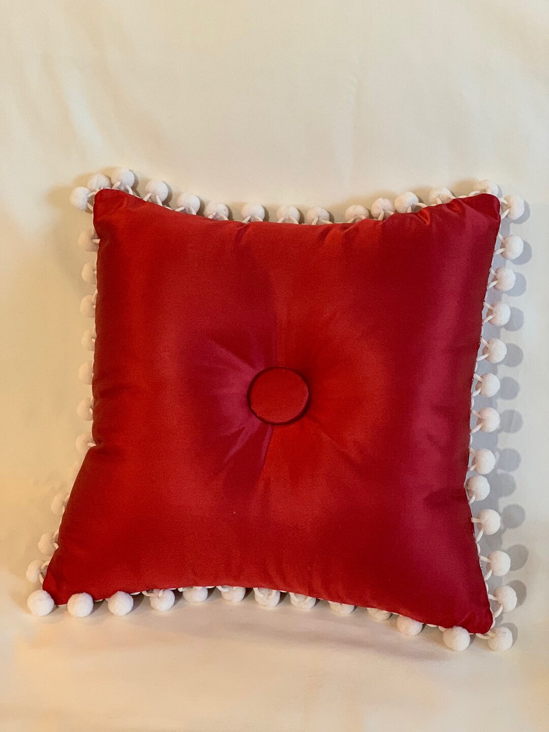 Natural Red Silk Pillow With White Fuzzy Pom Pom's and A Center Button ...