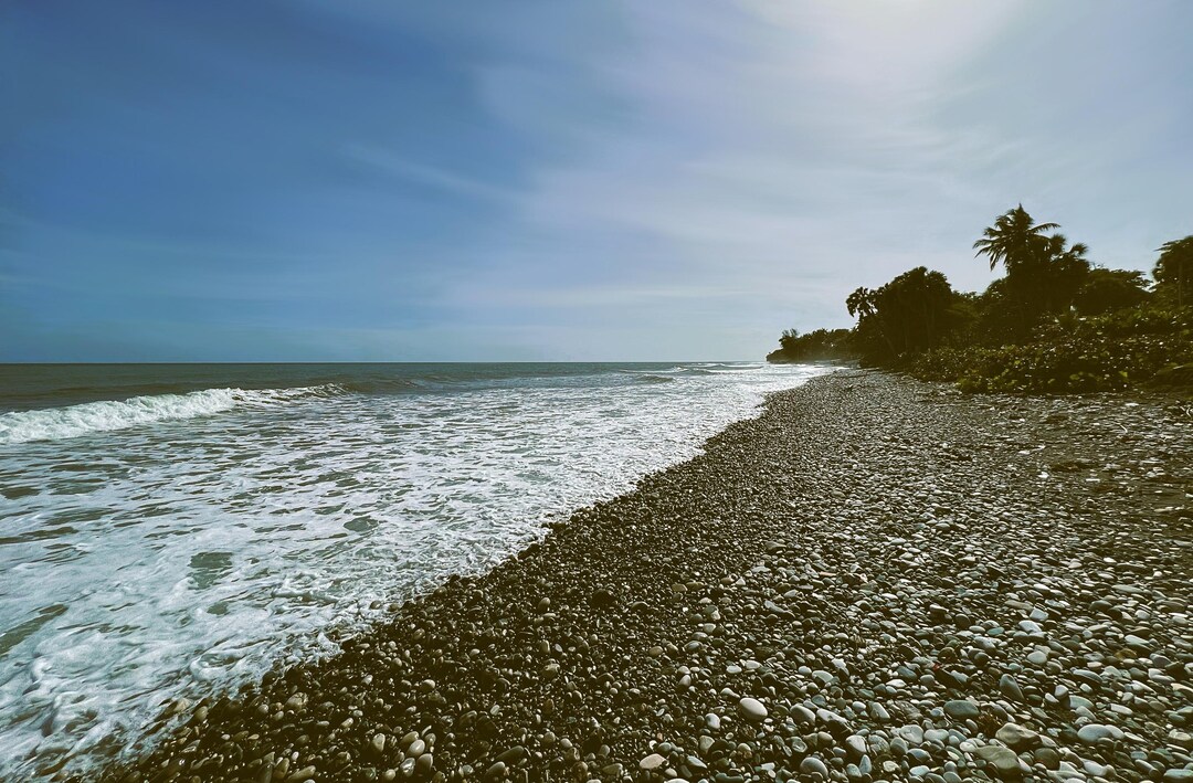 Dominican Republic Santo Domingo Malecon Pebble Shoreline Playa Guibia ...