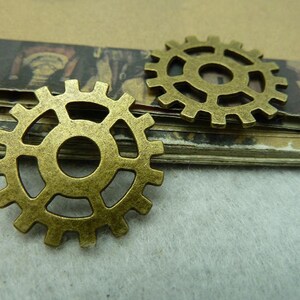 100pcs 11mm-15mm-18mm-20mm-25mm Filigree Gear Charm Pendant Jewelry ...