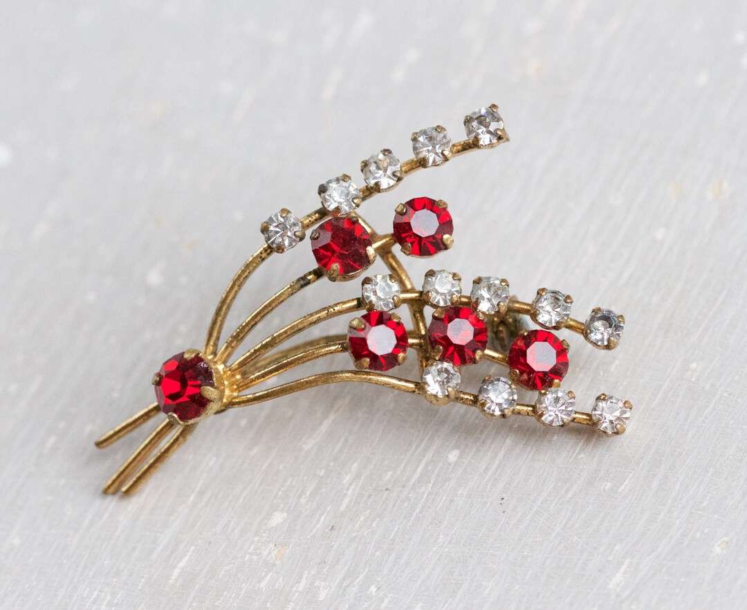 Art Deco Lapel Pin of Red and Clear Paste Stones on Brass Bouquet ...