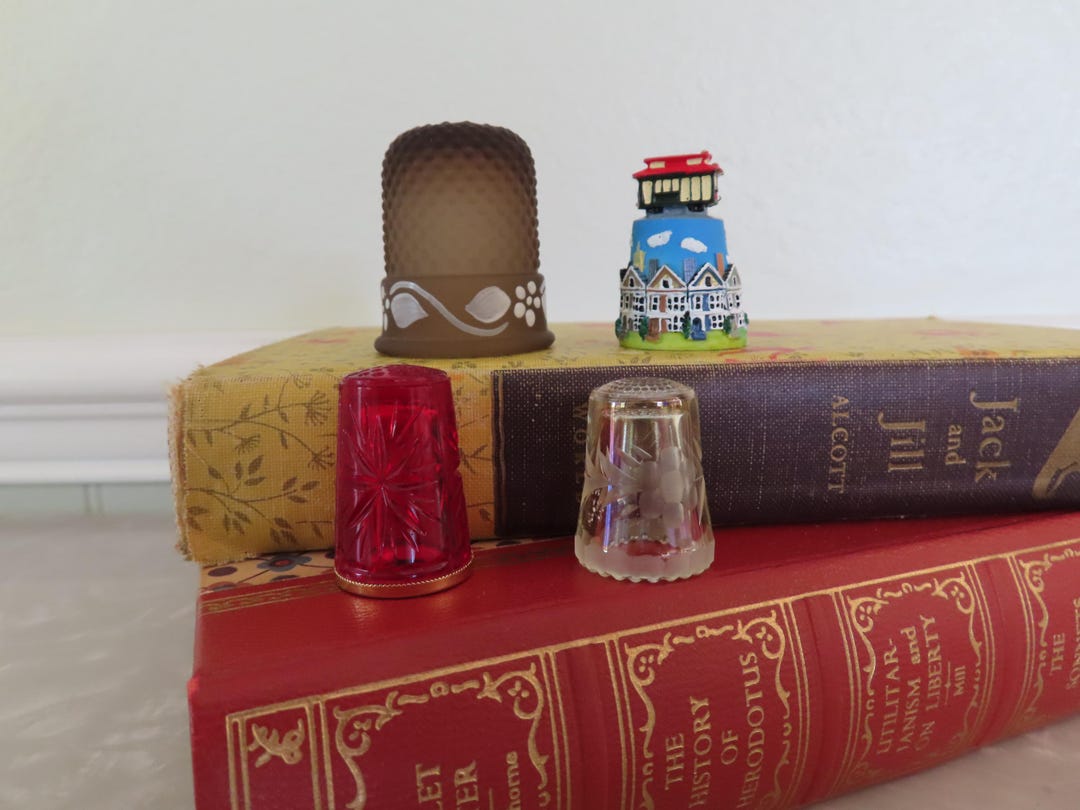 A Collection of Four Vintage Thimbles Etched Cranberry Red Clear Glass ...