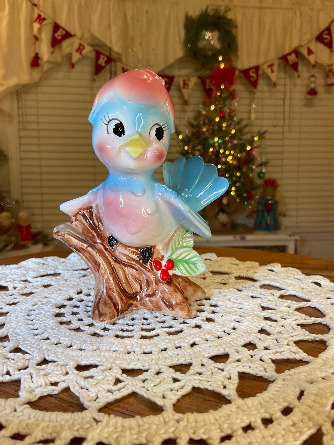 Vintage Charming Blue Bird Sitting on a Perch, Flower Top Blue Bird ...
